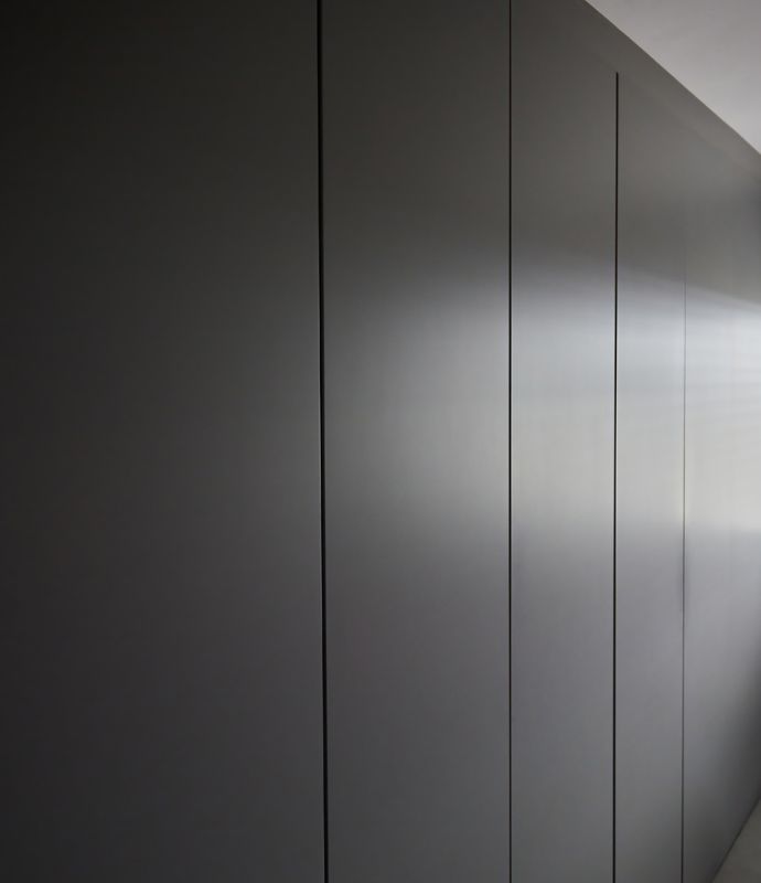 A sleek and modern fitted wardrobe for Andrew’s bedroom | Sharps