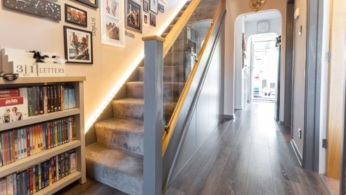 Beautifully Organised Understairs Storage Maximises This Space