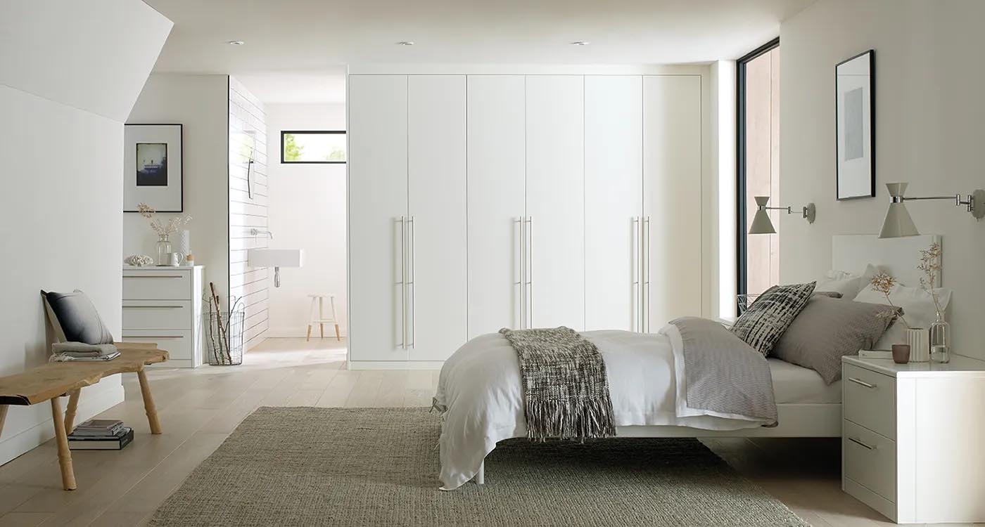 White gloss built in wardrobes store