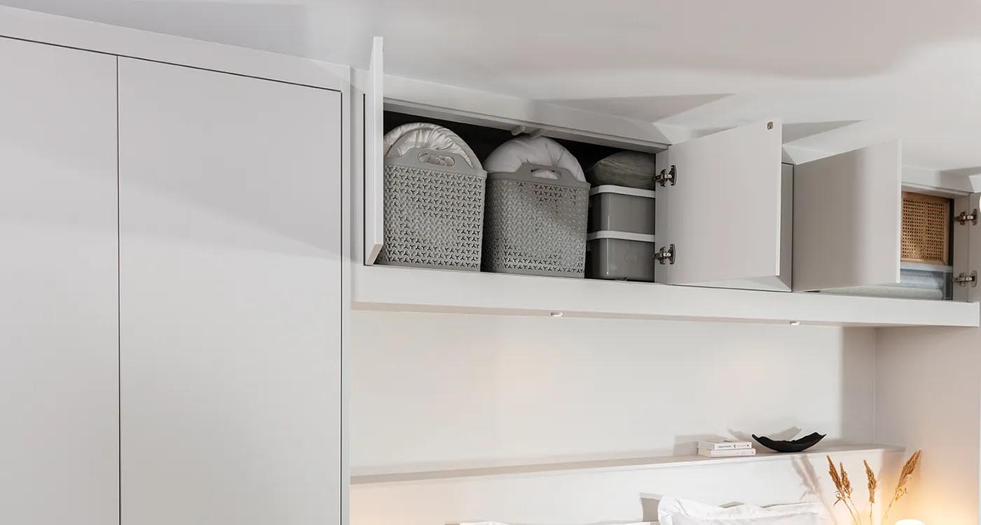 Overbed Wardrobe and Storage Solutions | Bespoke Fitted Furniture | Sharps